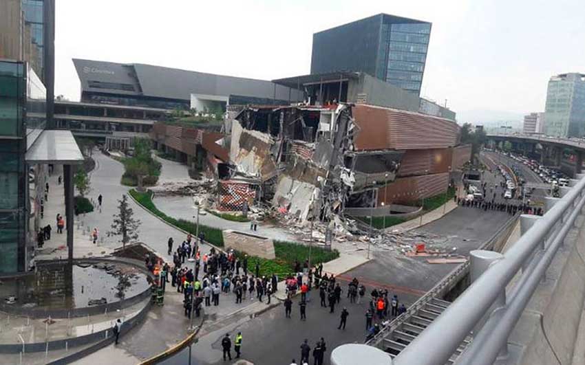 Hundreds saved by advance warning of commercial center's collapse