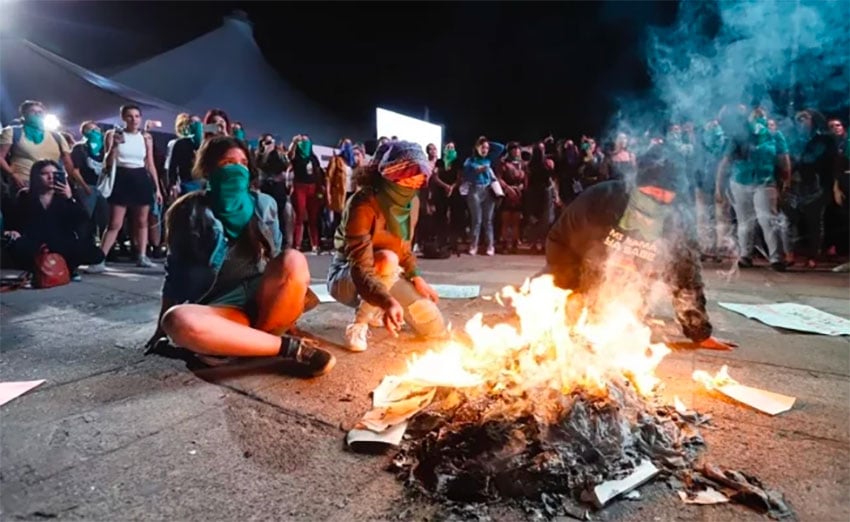 Feminists burn book about changing sexual orientation