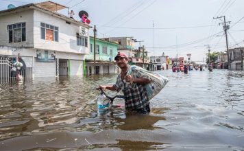 Rain has stopped but swollen river causes severe flooding in Villahermosa