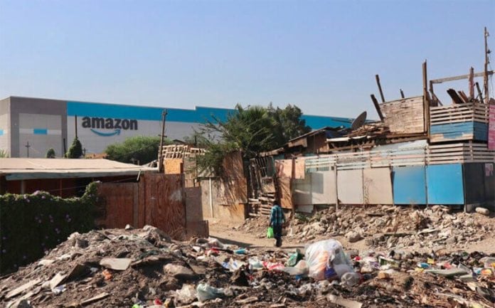 Amazon building in Tijuana sits in sharp contrast to its surroundings
